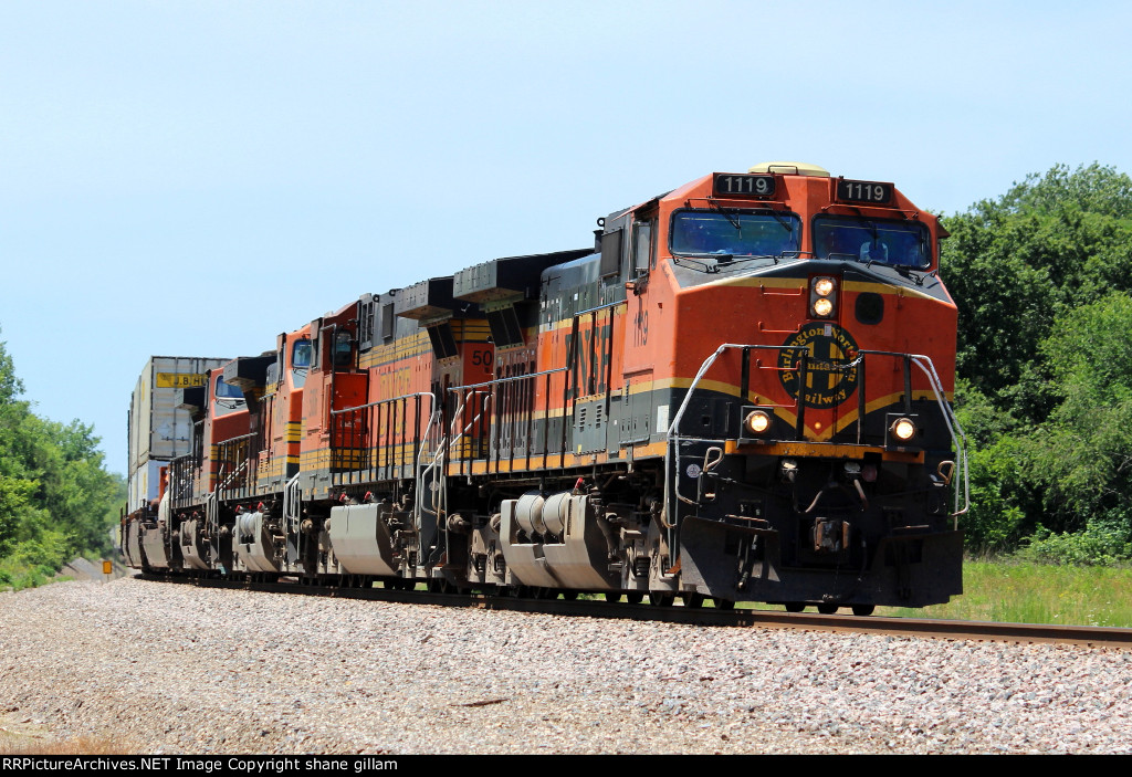 BNSF 1119 Leads a EB stack train on a hot June day.